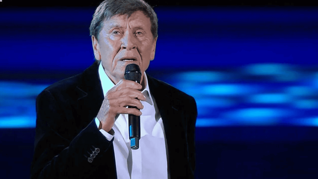 Gianni Morandi in lacrime ferma il concerto per una comunicazione ...